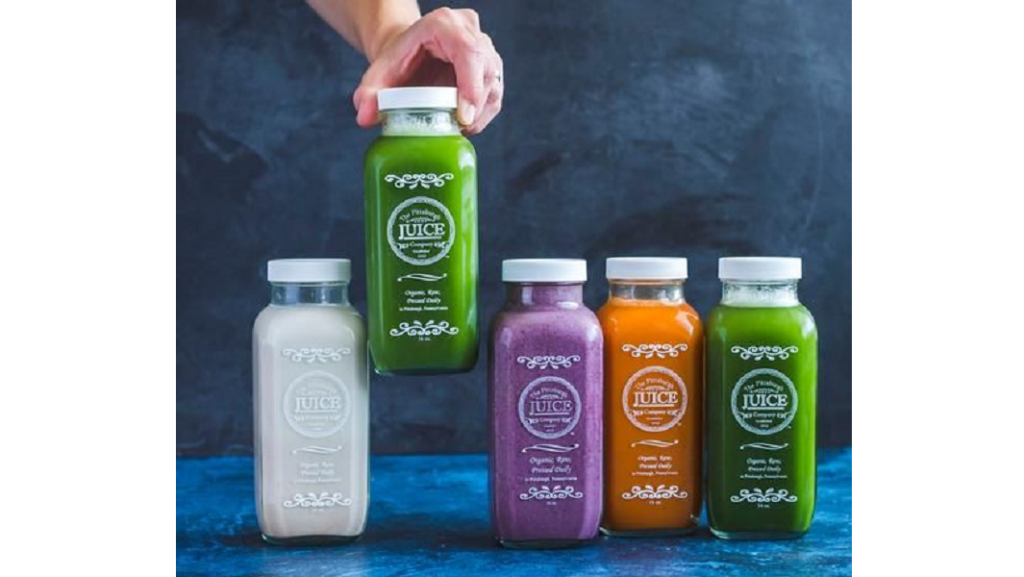 Comparison types of juice packaging between glass vs plastic vs cans